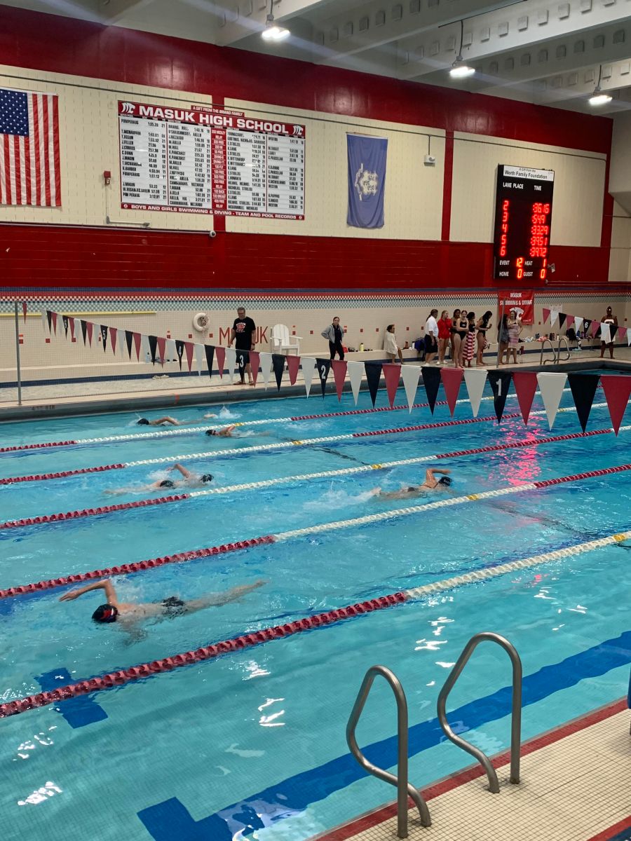 Girls Swim and Dive Floats Above the Competition – Masuk Free Press